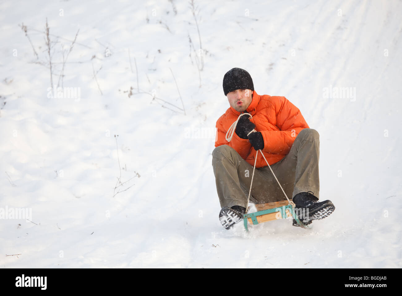 Sledging down hill hi-res stock photography and images - Alamy
