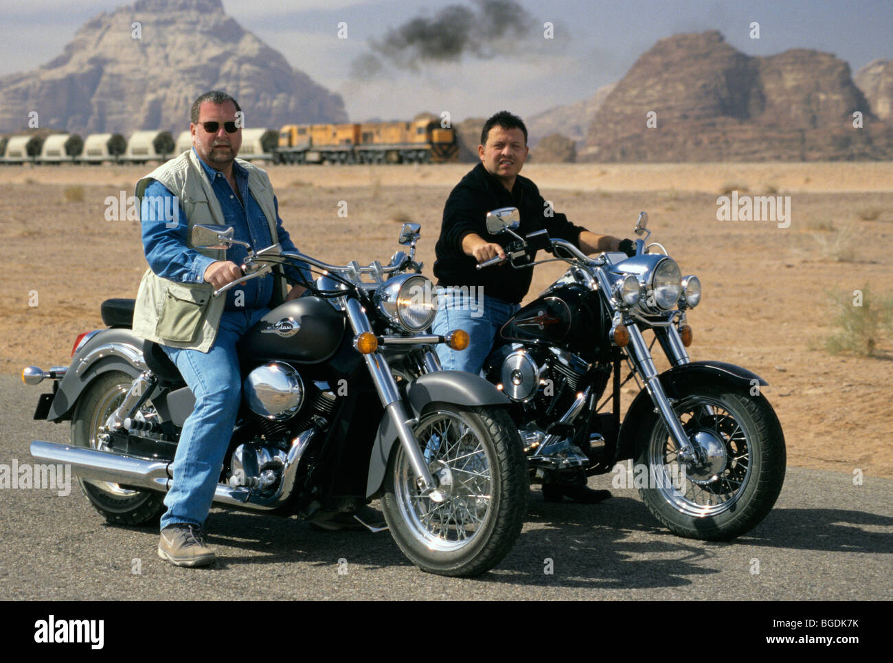 King Abdullah II of Jordan riding motorcycle in Wadi Rum Stock Photo ...