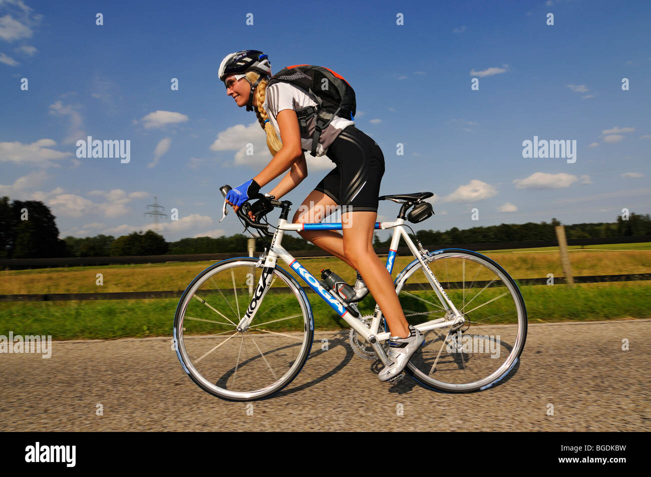 Cycling with a rucksack hi-res stock photography and images - Alamy