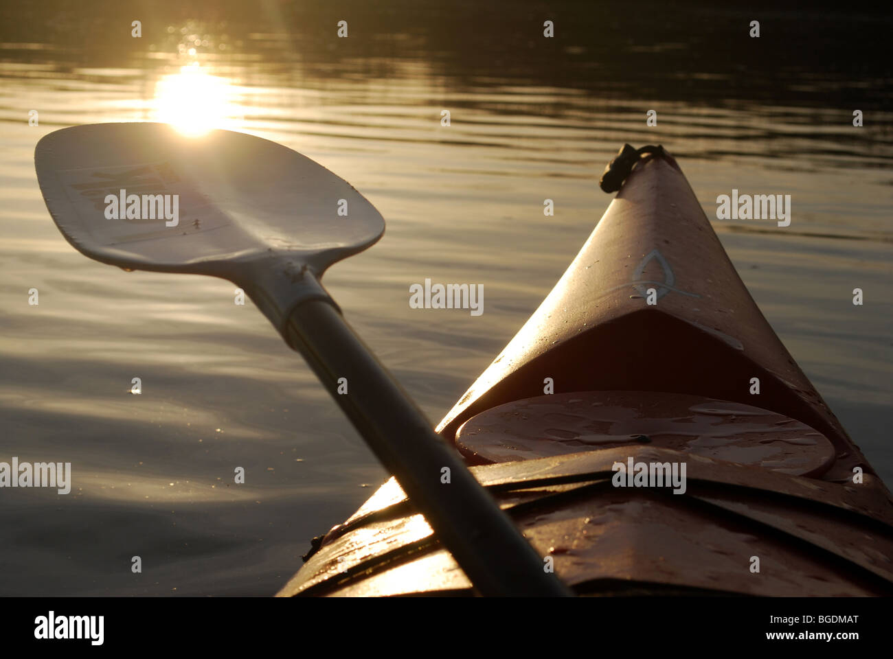 Sunset sea kayak Stock Photo - Alamy
