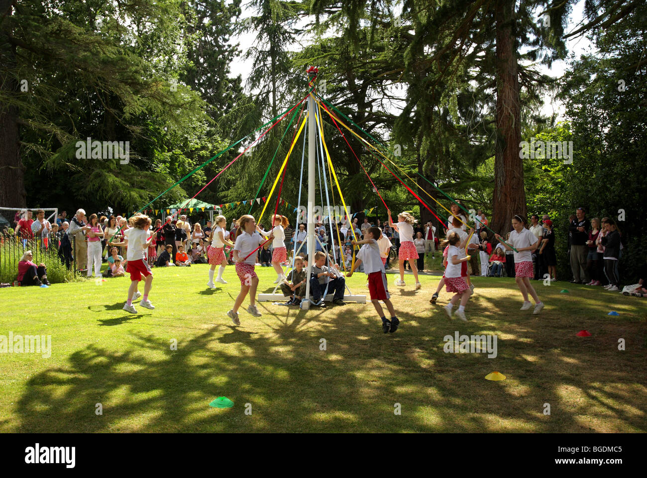 School children from Church Preen school in Shropshire dancing around ...