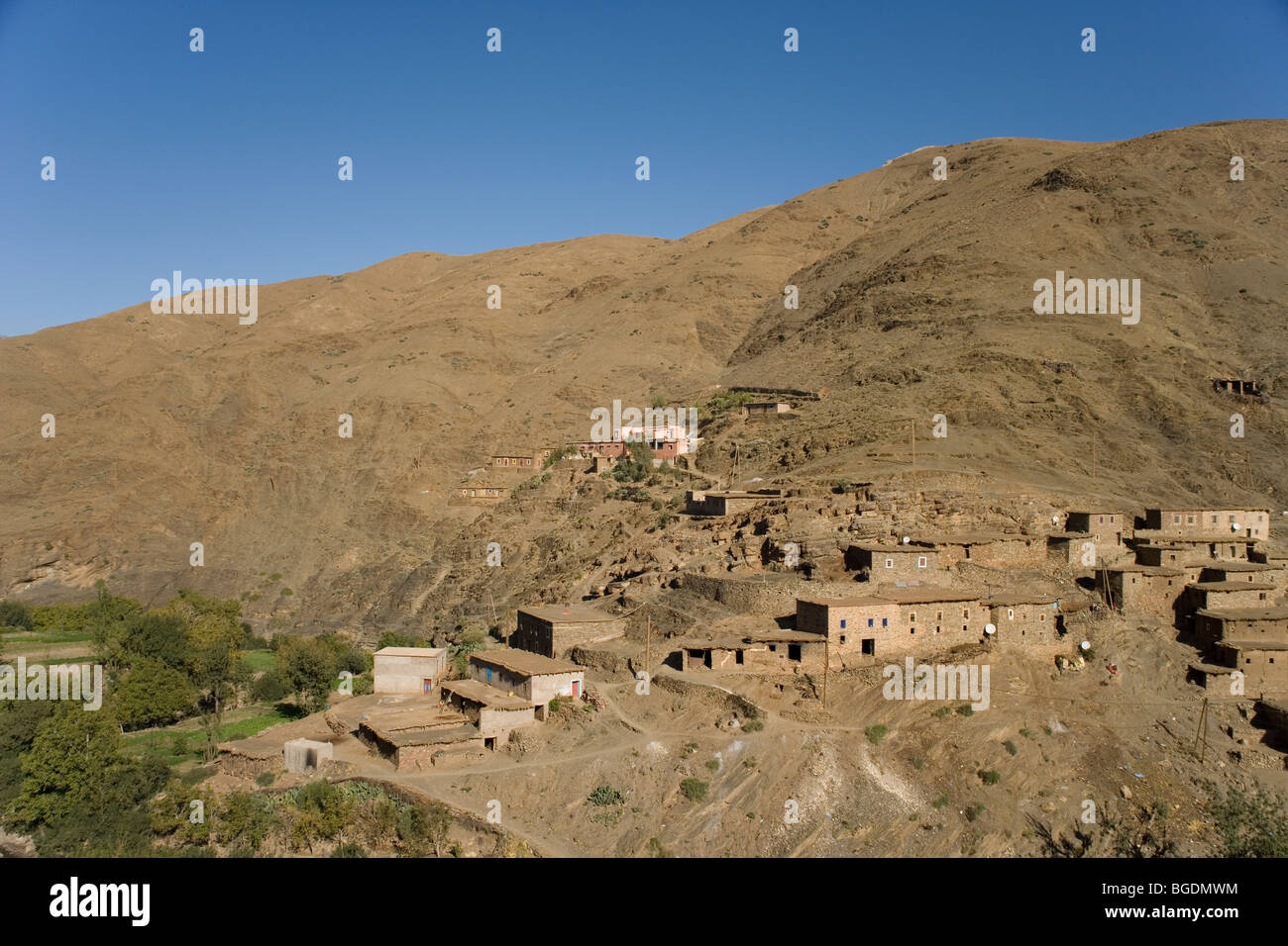 Village climbing up the valley on the Tizi n Tichka Pass travelling on ...