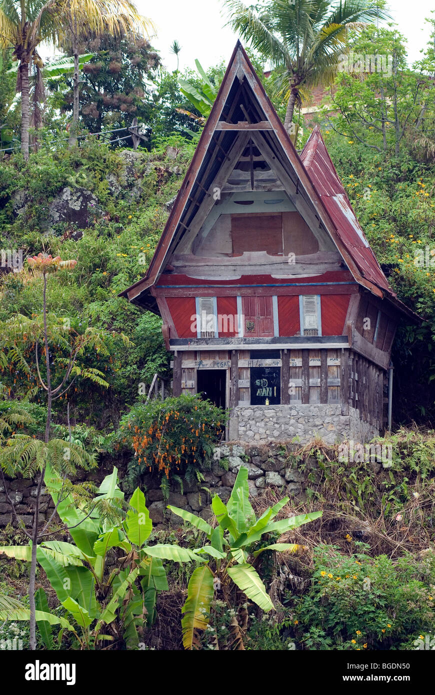 The characteristic sweeping prow-shaped roofs of Batak houses Stock ...