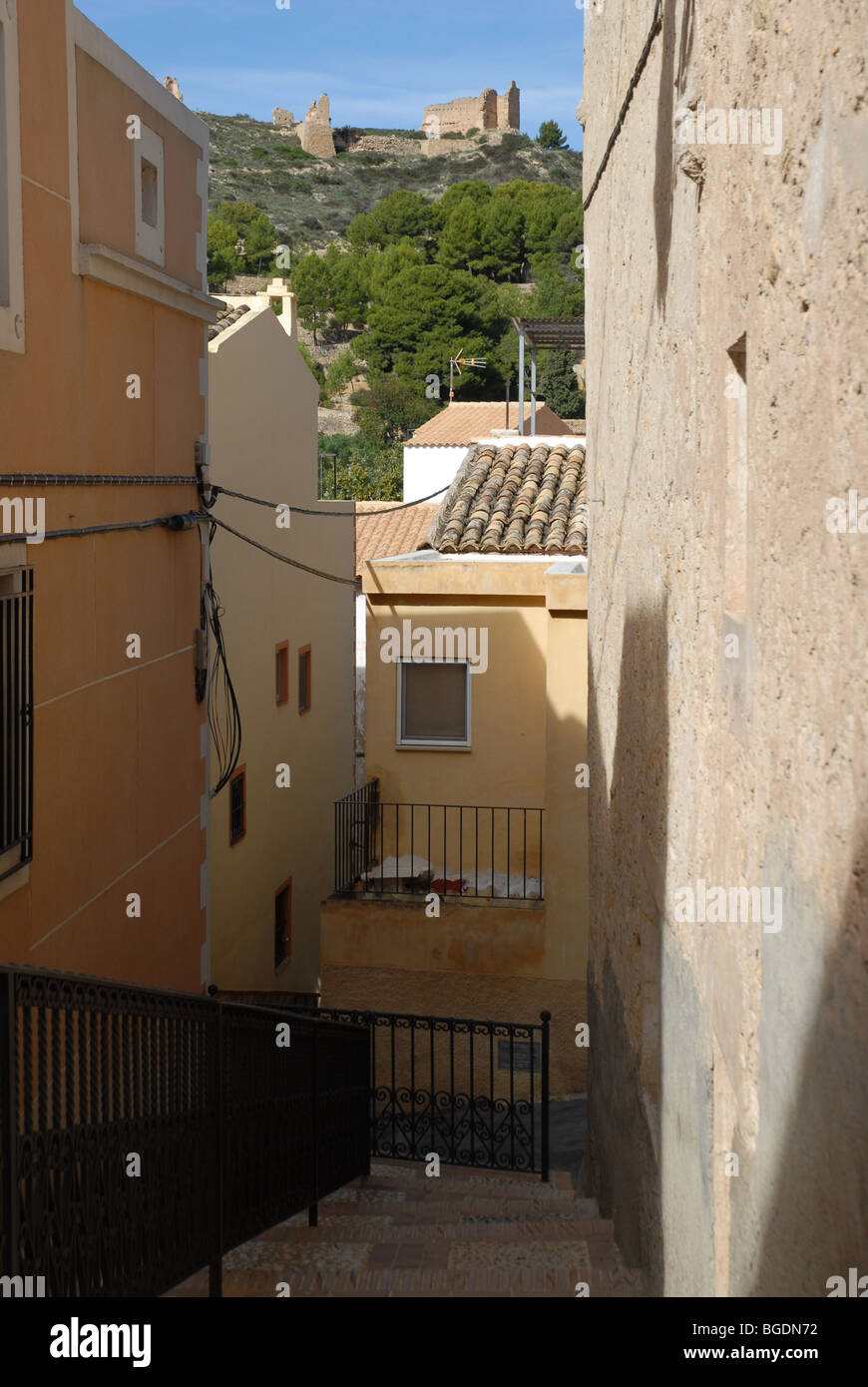 steep and narrow street in the mountain village of Relleu, Alicante ...