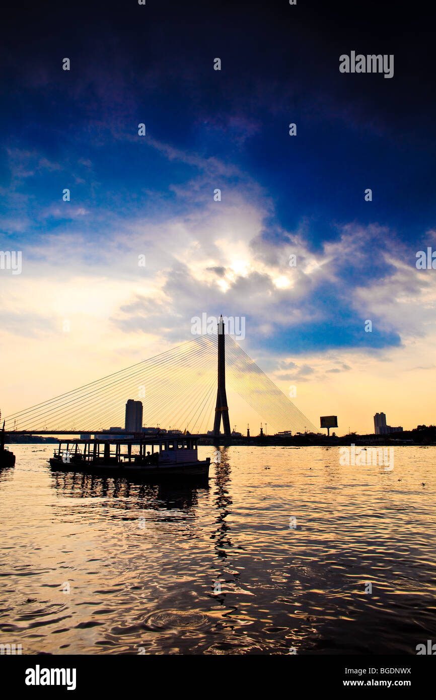 Suspension Bridge with dramatic clouds above Stock Photo - Alamy