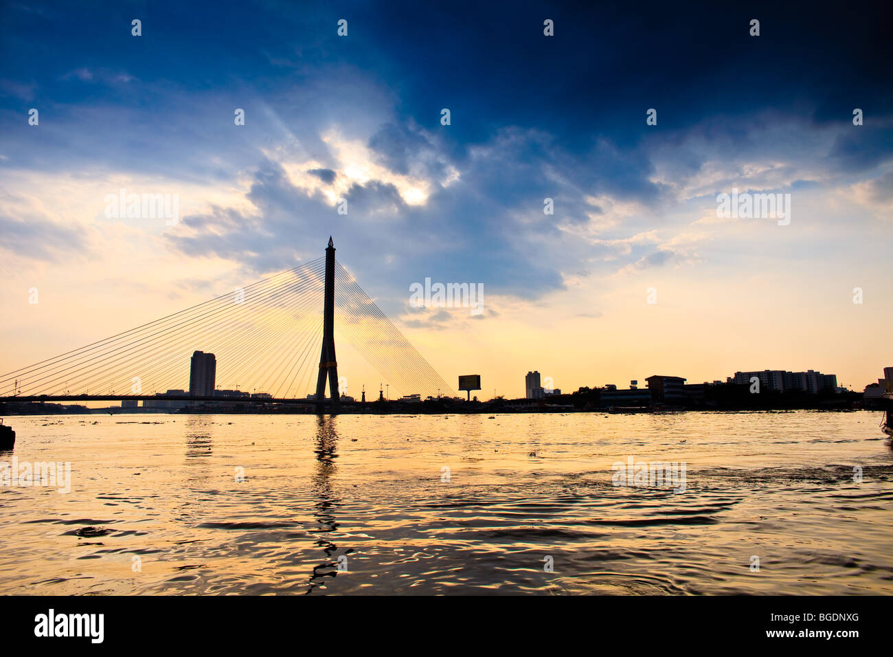 Suspension Bridge with dramatic clouds above Stock Photo - Alamy