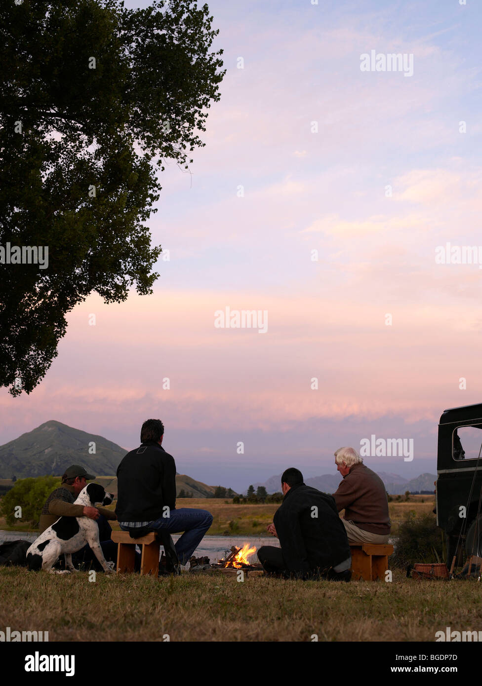 Sitting beside fire hi-res stock photography and images - Alamy