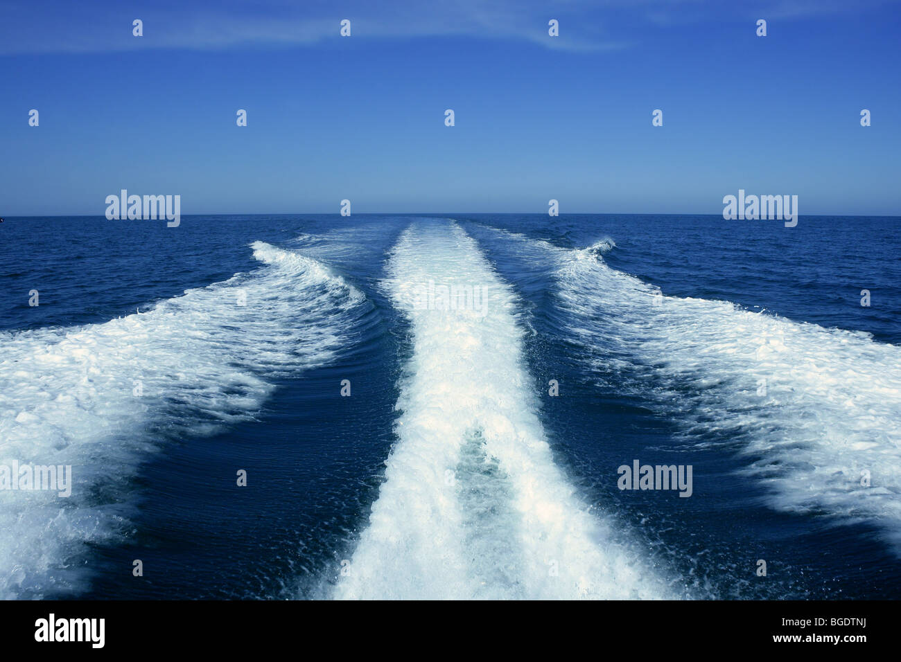 Fishing speedy boat prop wash, white wake on the blue ocean sea Stock ...