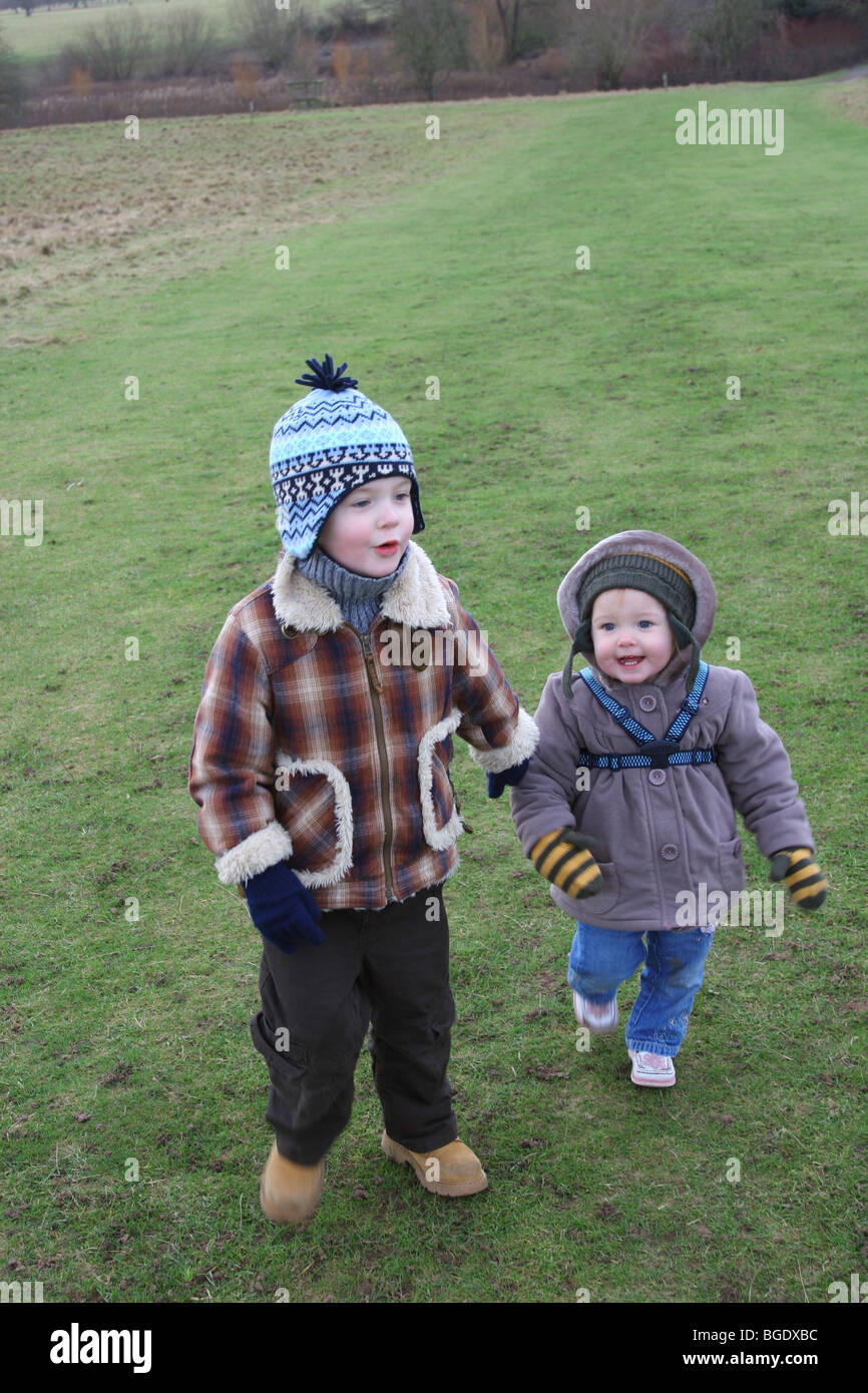 Two small children out for the day in the countryside Stock Photo - Alamy