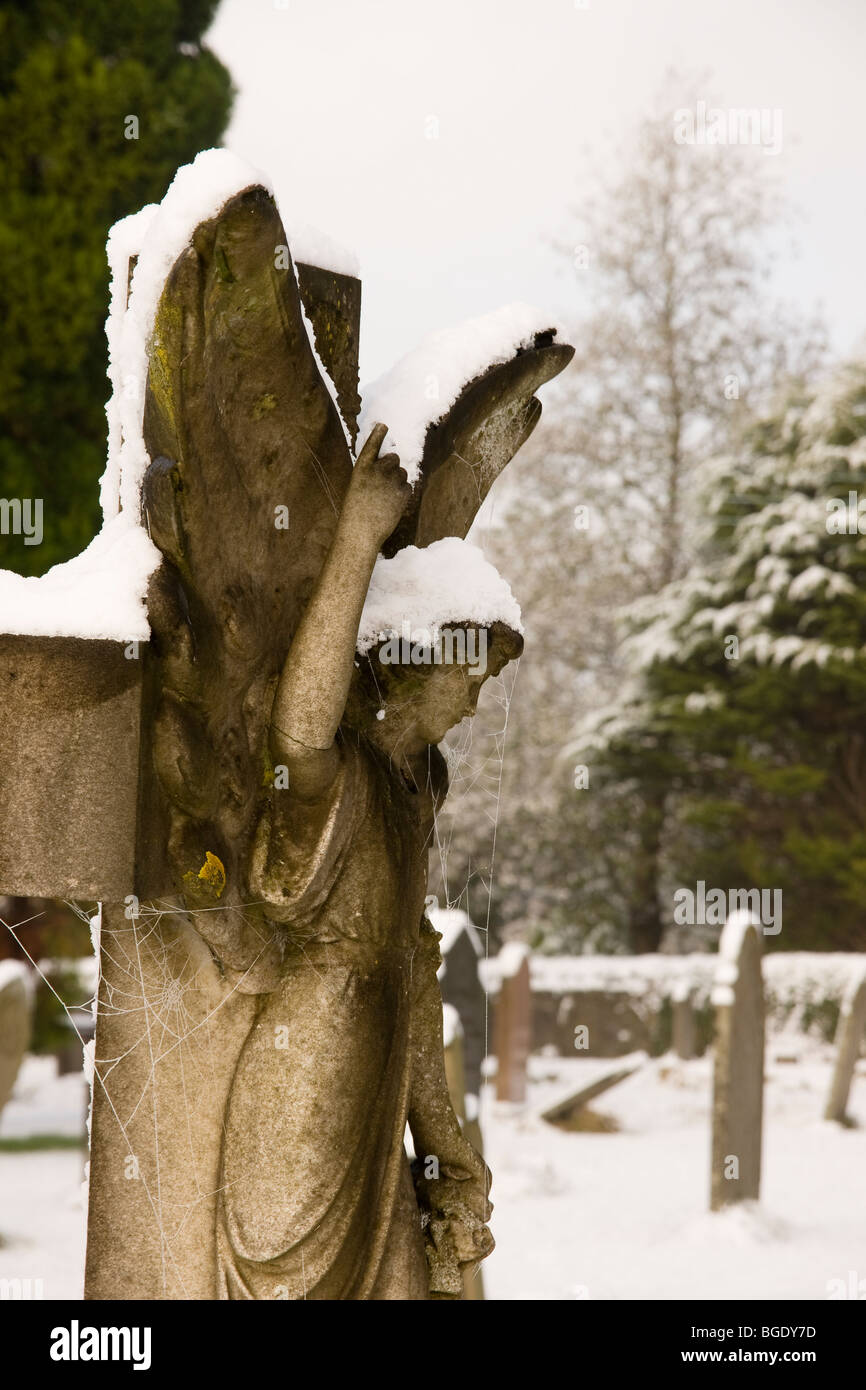 Gothic angel in snow Stock Photo - Alamy