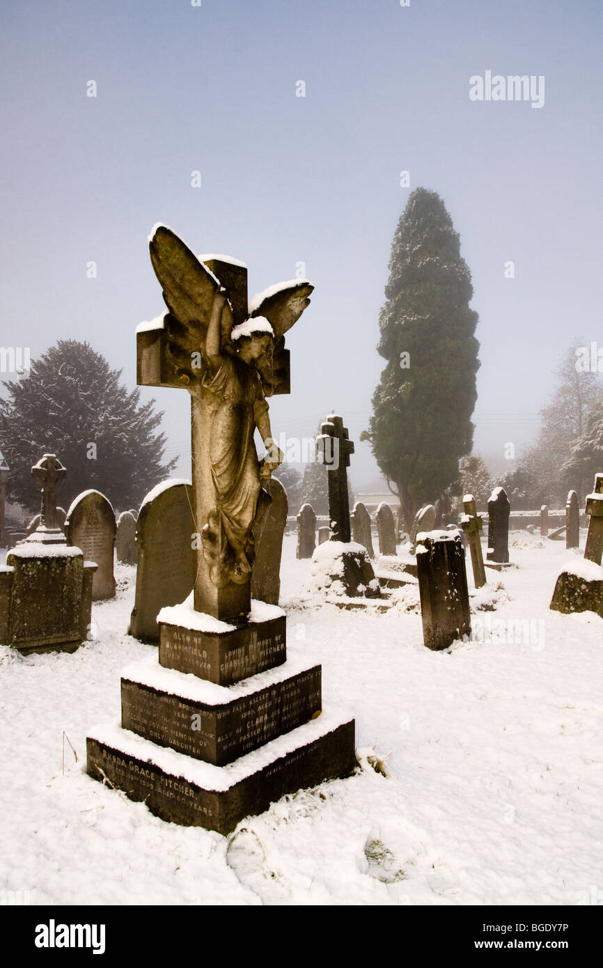 Gothic angel in snow Stock Photo - Alamy