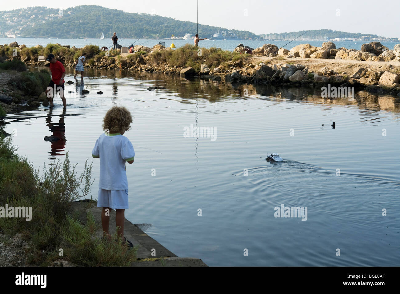 Boy model boat hi-res stock photography and images - Alamy