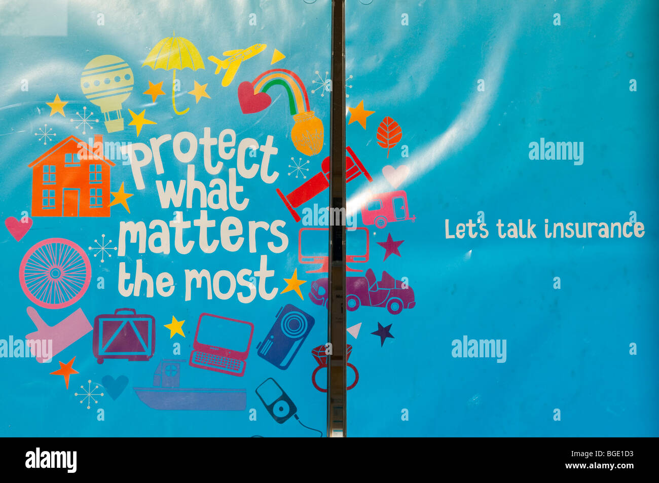 A sign advertising insurance in a shop window in the Uk Stock Photo - Alamy