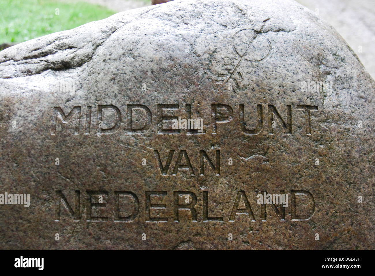 Large rock inscribed 'Middelpunt van Nederland' (the centre point of ...