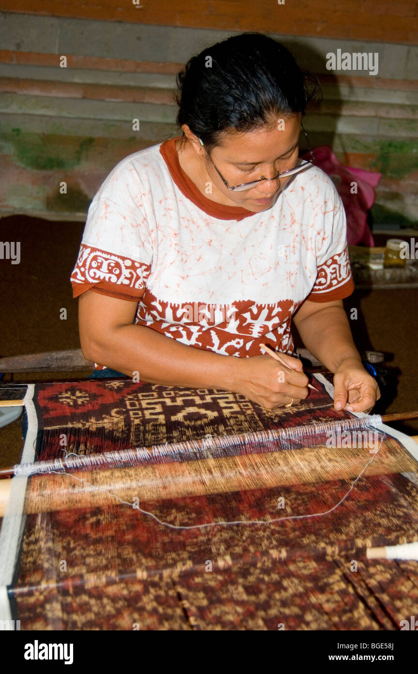 Bali Aga weaver producing Double Ikat textiles at Tenganan village ...