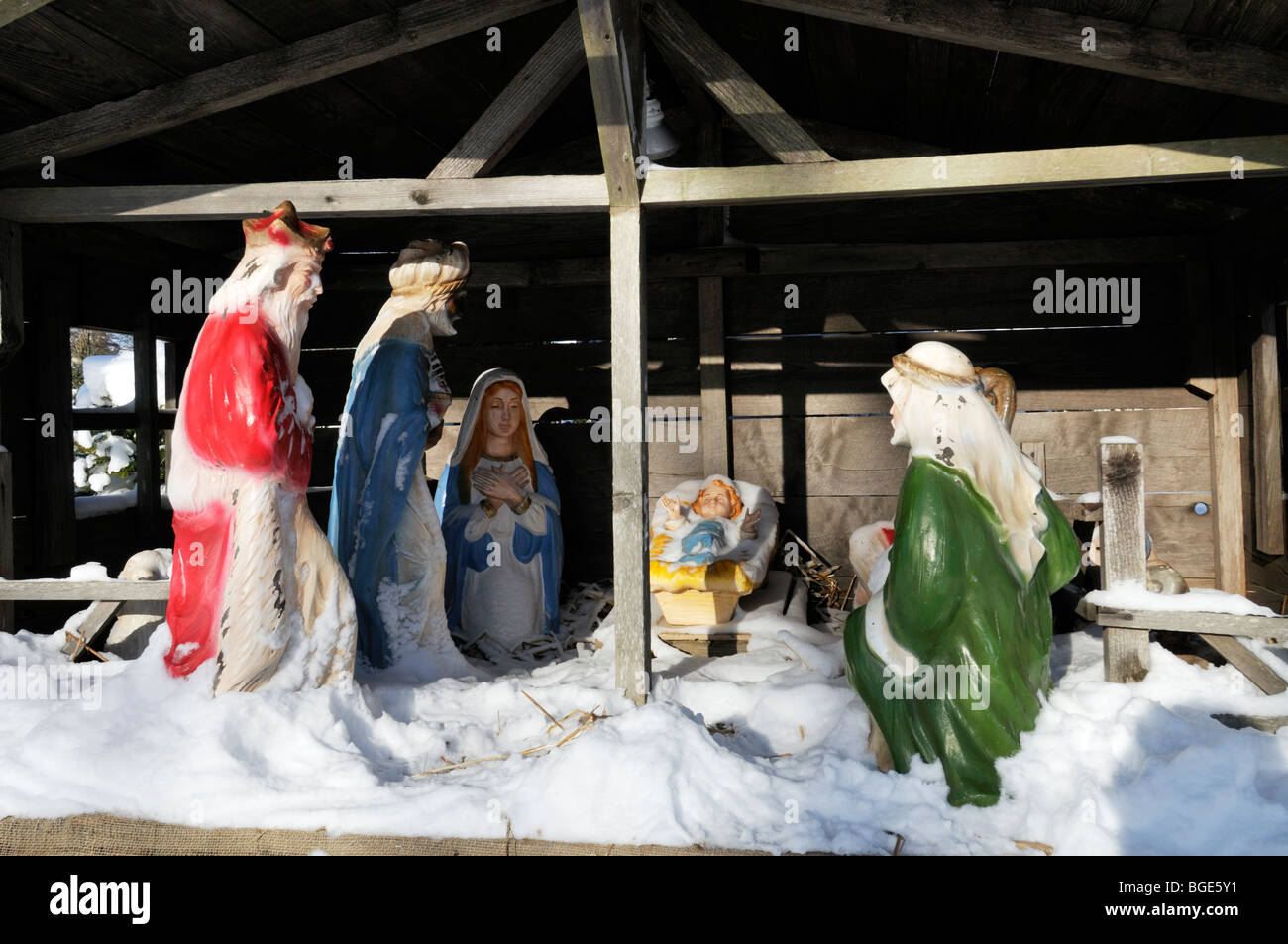 Christmas nativity scene outdoors with snow showing Jesus in manger ...