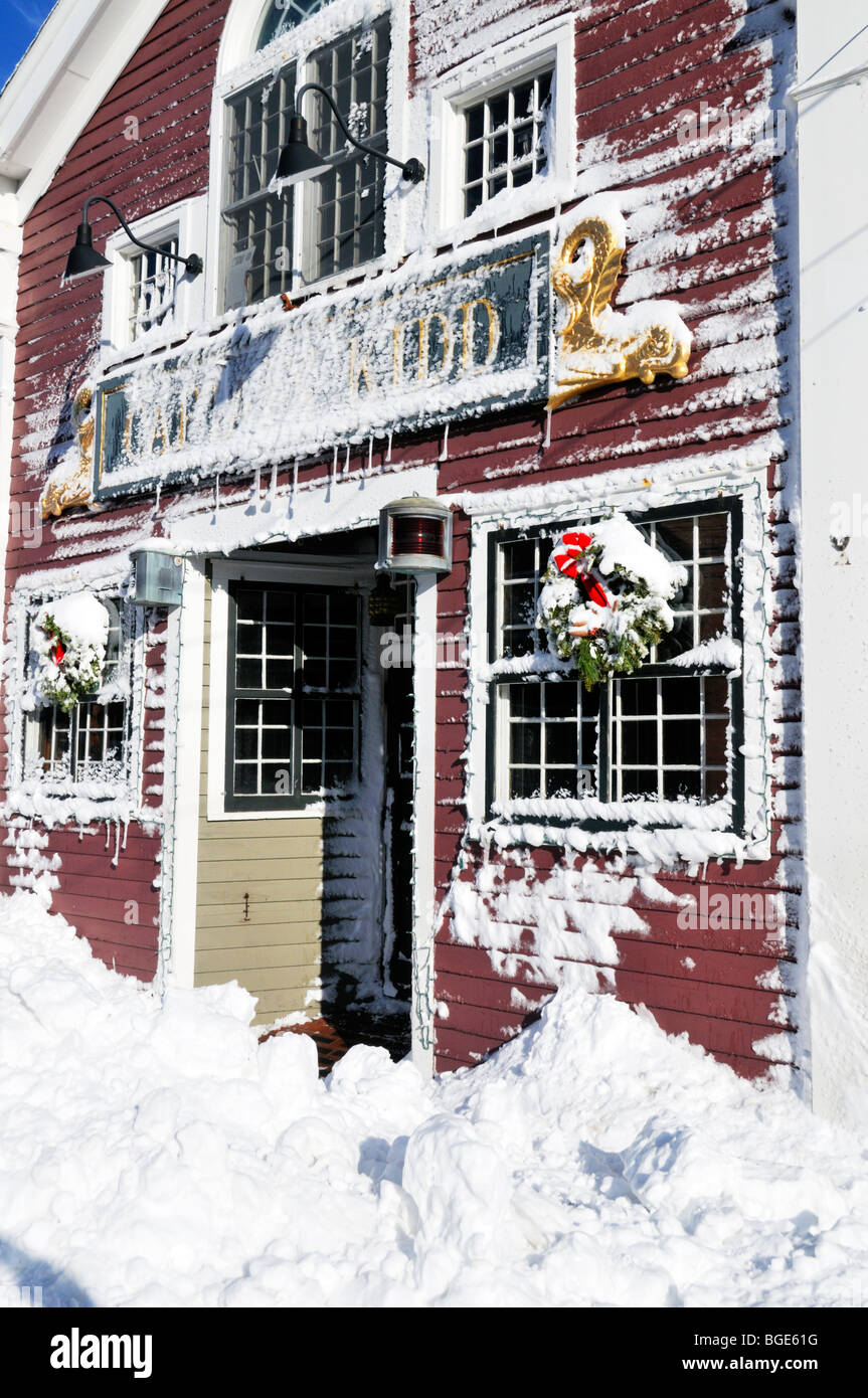 Snow covered building exterior in Woods Hole, Falmouth, Cape Cod with ...