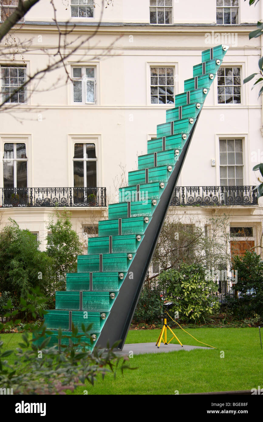 Turquoise tapered glass stairwell situated in Wilton Crescent in ...