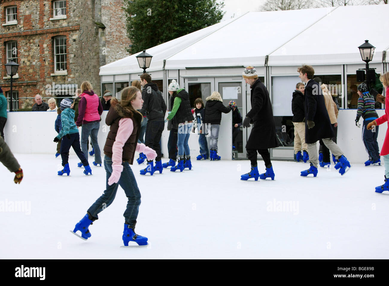 People of all ages ice skating at an outdoor rink Stock Photo - Alamy