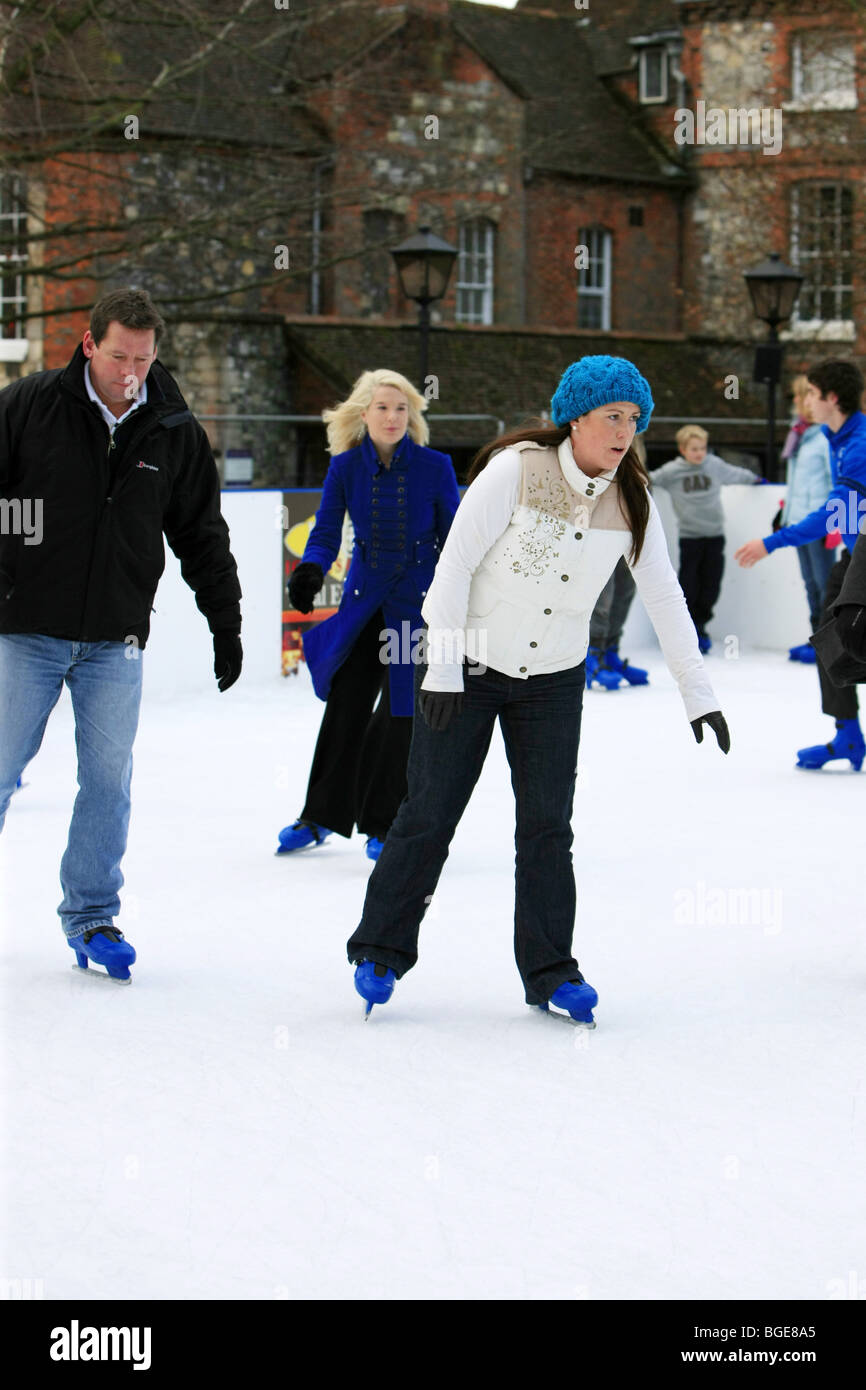 People ice skating at an outdoor rink Stock Photo - Alamy