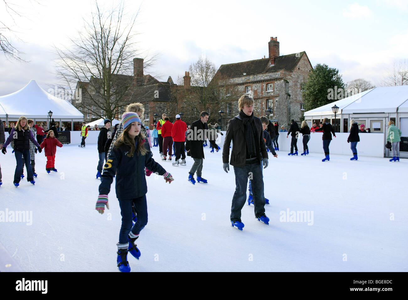 People of all ages ice skating at an outdoor rink Stock Photo - Alamy