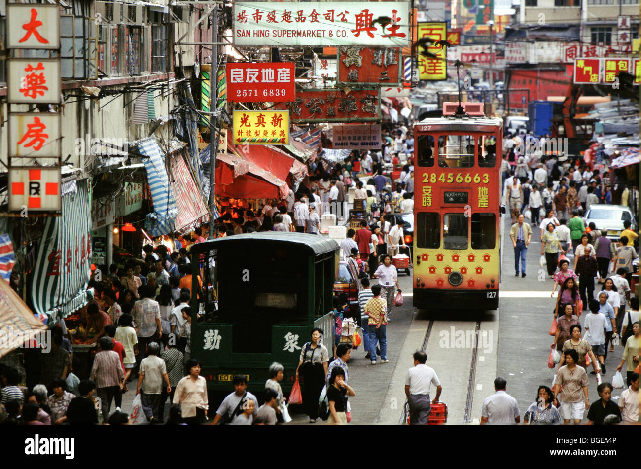 Trans run through Hong Kong's busy streets, 1996 Stock Photo - Alamy