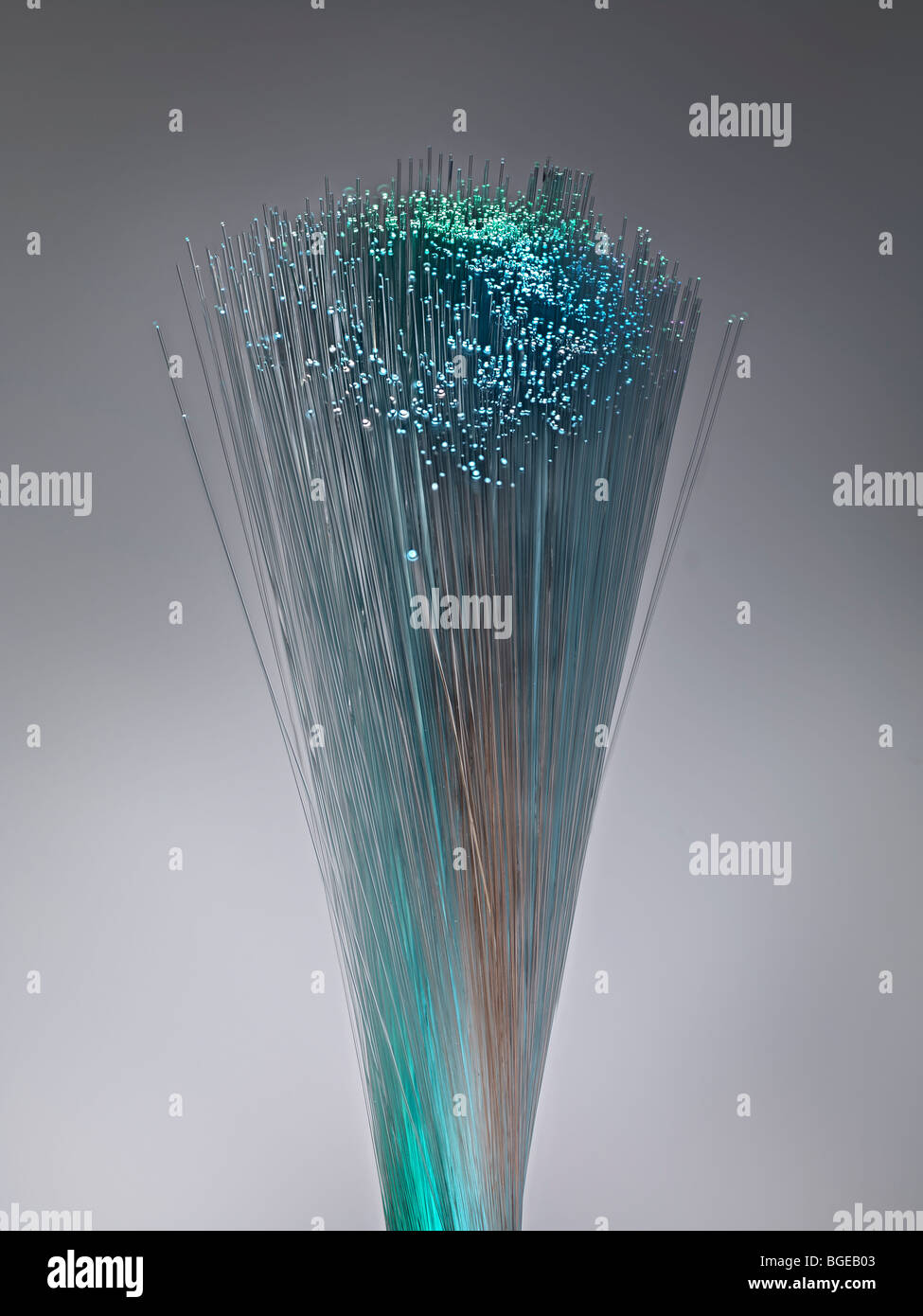 A bunch of fiber-optic cables with lights protruding out of them Stock ...