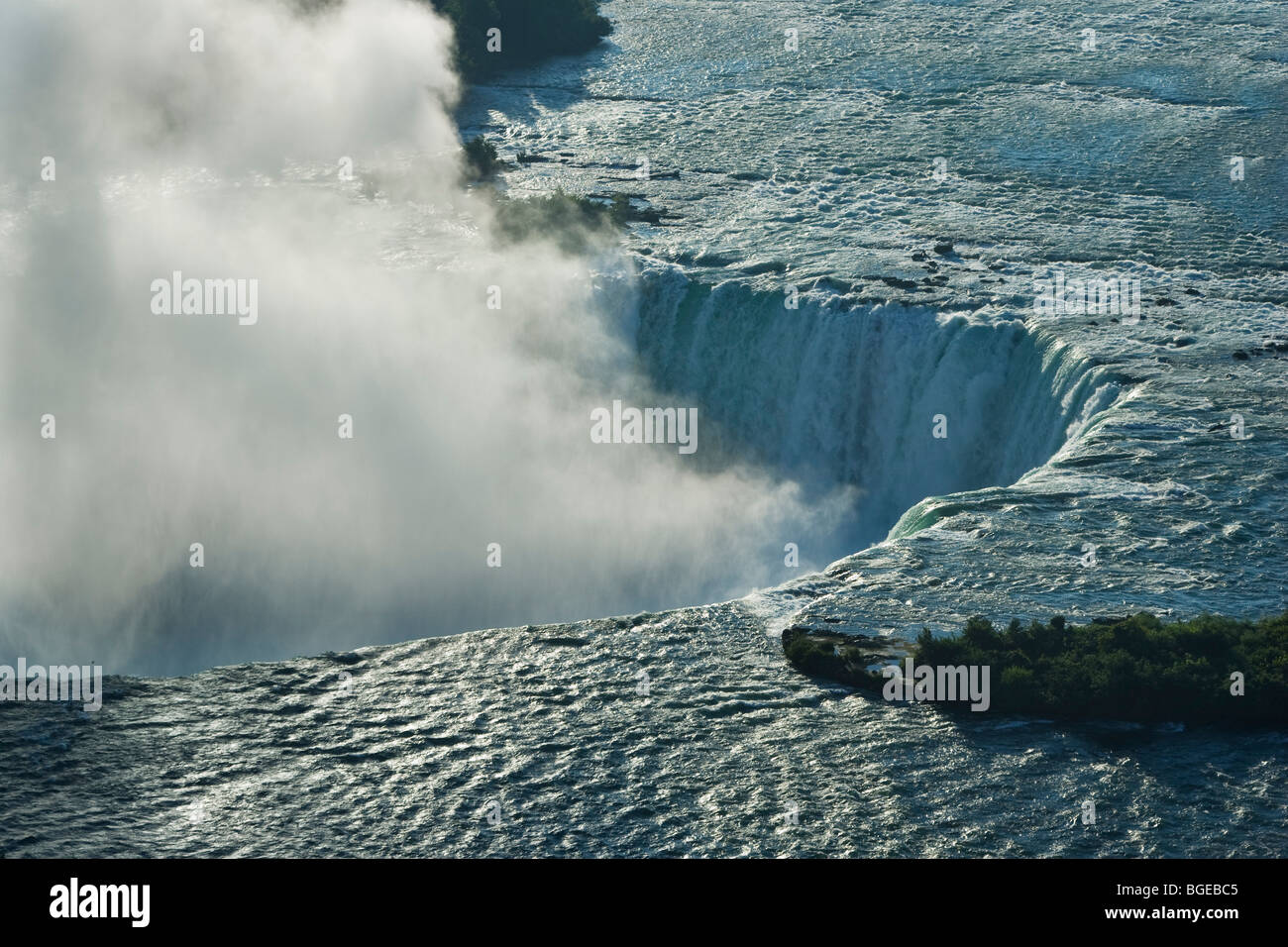 A cloud of condensed water surfaces from the Niagara Fall Stock Photo ...