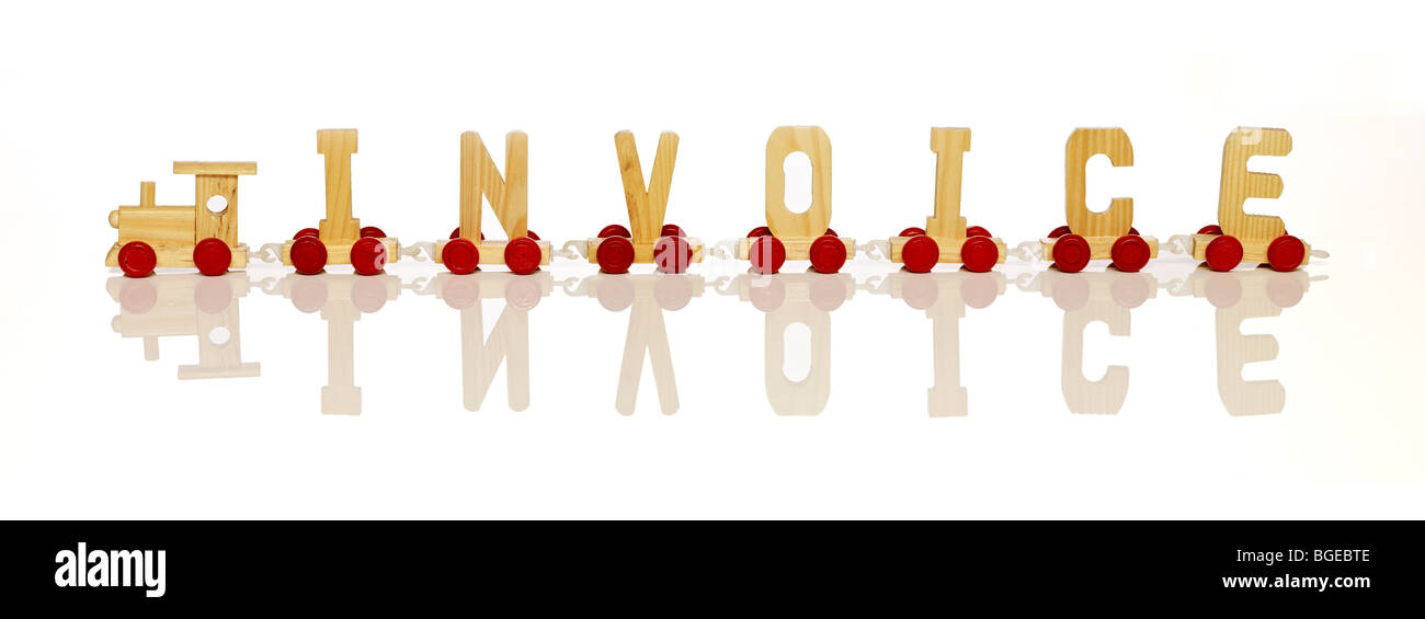 A toy letter carts train forming word invoice Stock Photo - Alamy