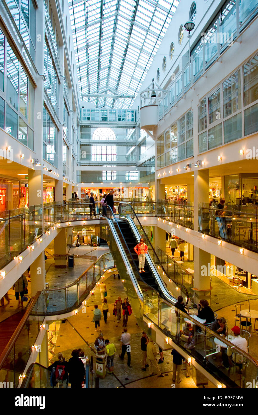 An ultra-modern shopping mall at Aker Brygge Oslo's popular harborfront ...