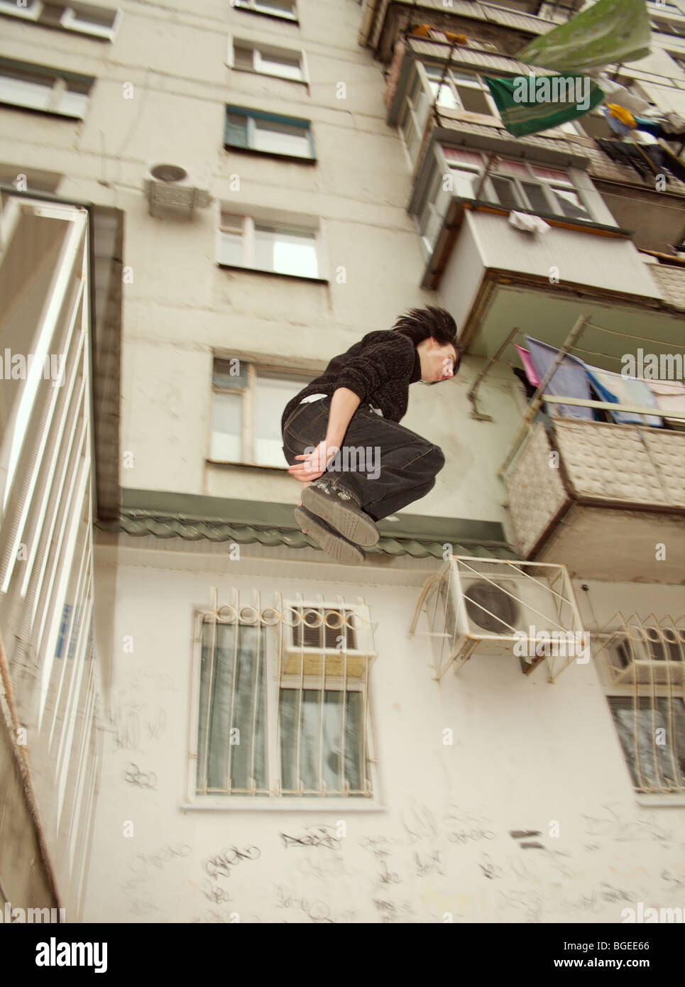 Teenager carries out dangerous exercises Stock Photo - Alamy