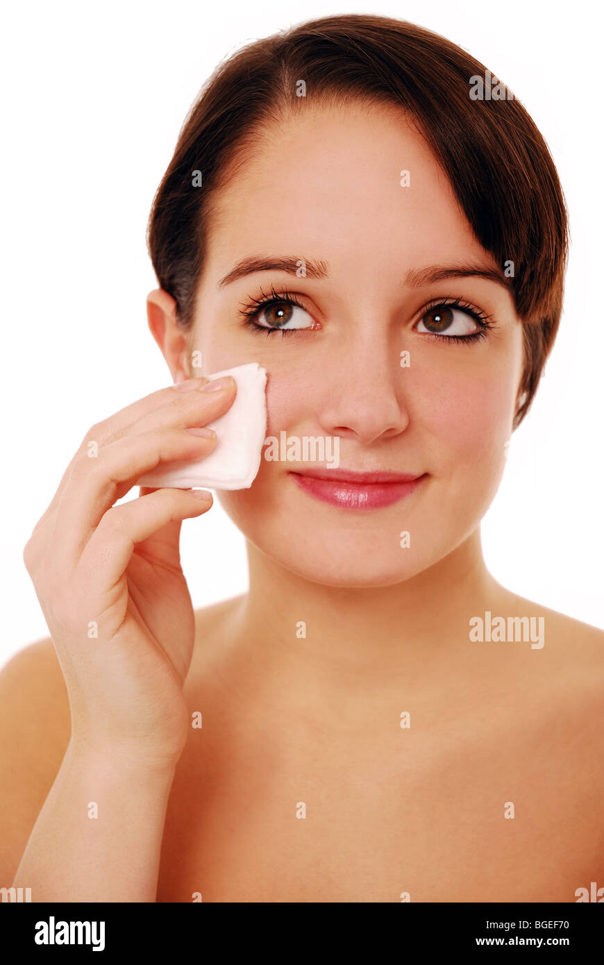 Young lady removing make up Stock Photo - Alamy