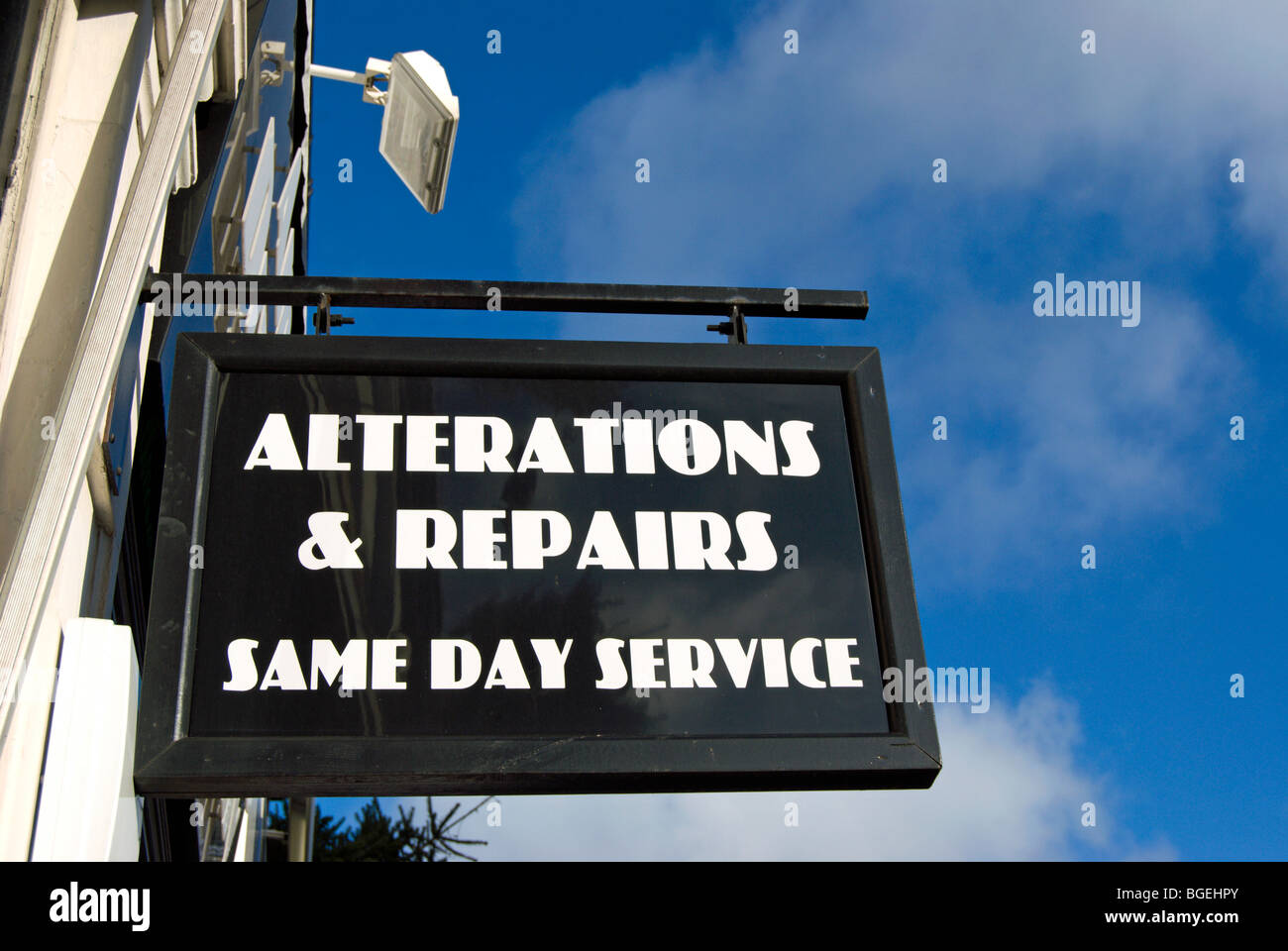 alterations and repairs sign outside a clothing shop in wimbledon ...