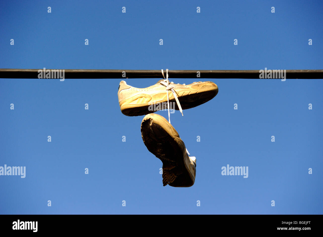 Shoes hanging wire hi-res stock photography and images - Alamy