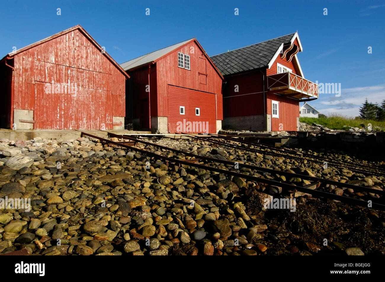 Boat houses on the beach at Ulsteinvik, Norway Stock Photo - Alamy