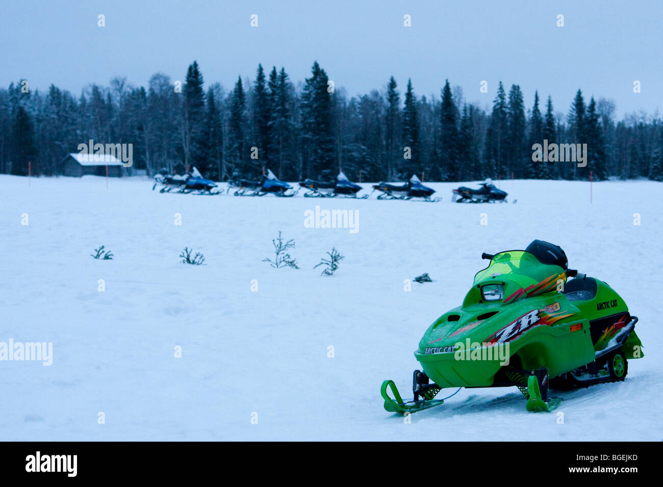 Snowmobiles in Lapland, in a snowy landscape Stock Photo - Alamy