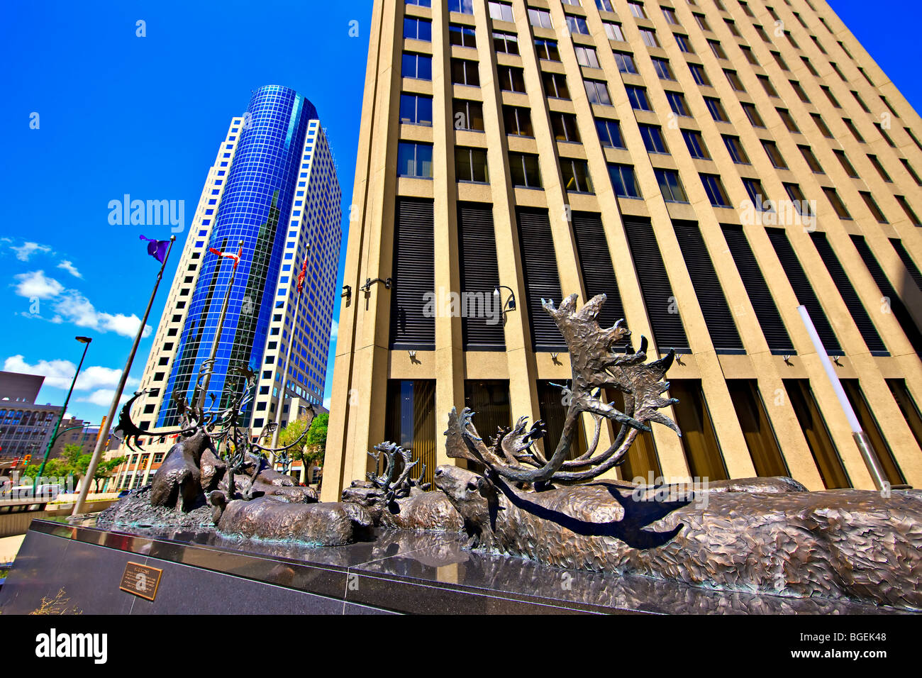 Bronze sculpture of caribous crossing a river, titled "Seal River ...