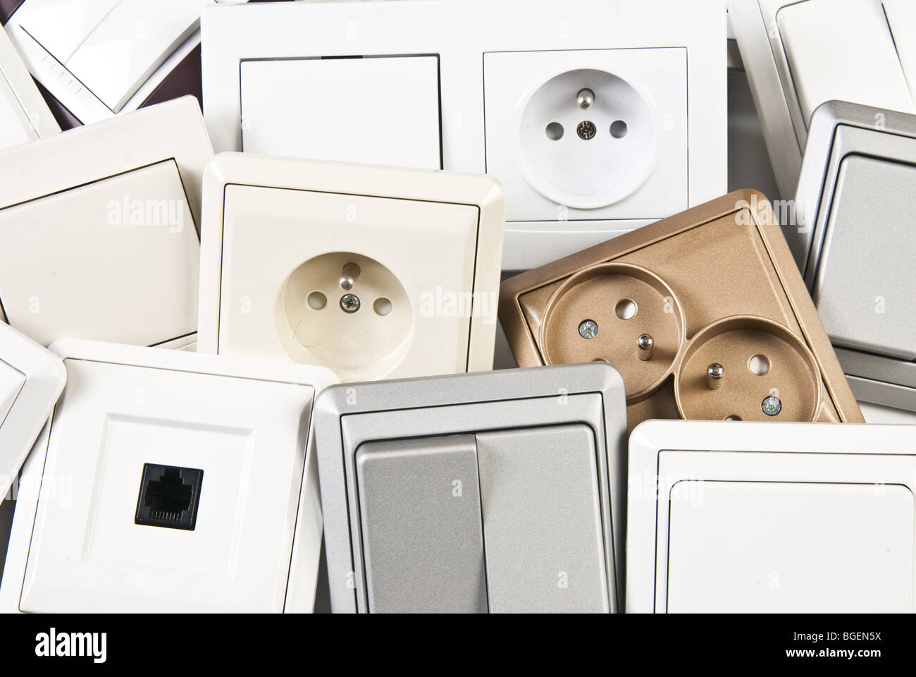 couple of electrical colorful switches and sockets Stock Photo - Alamy