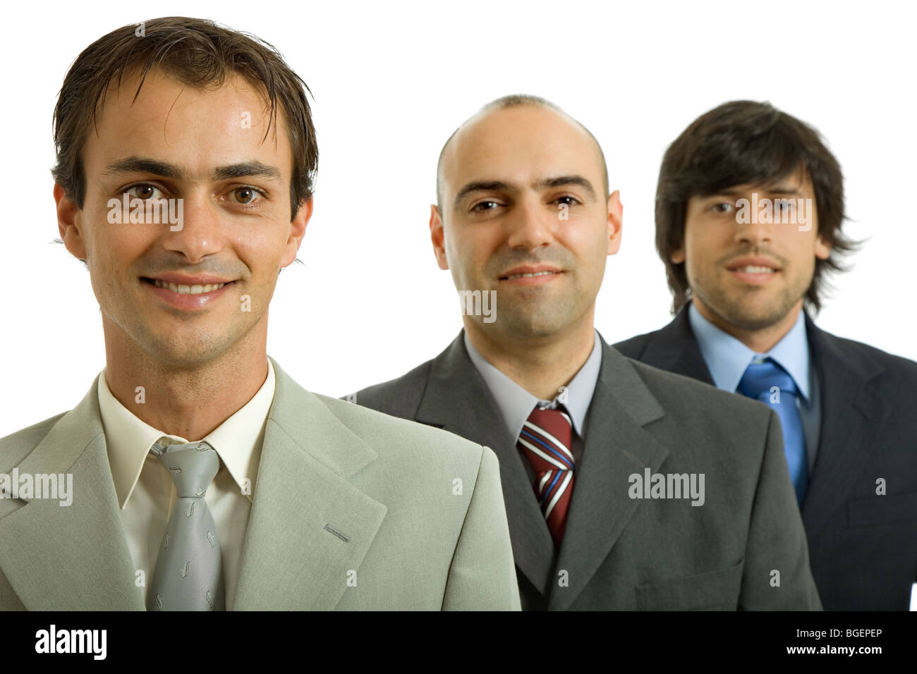 three business men isolated on white background Stock Photo - Alamy