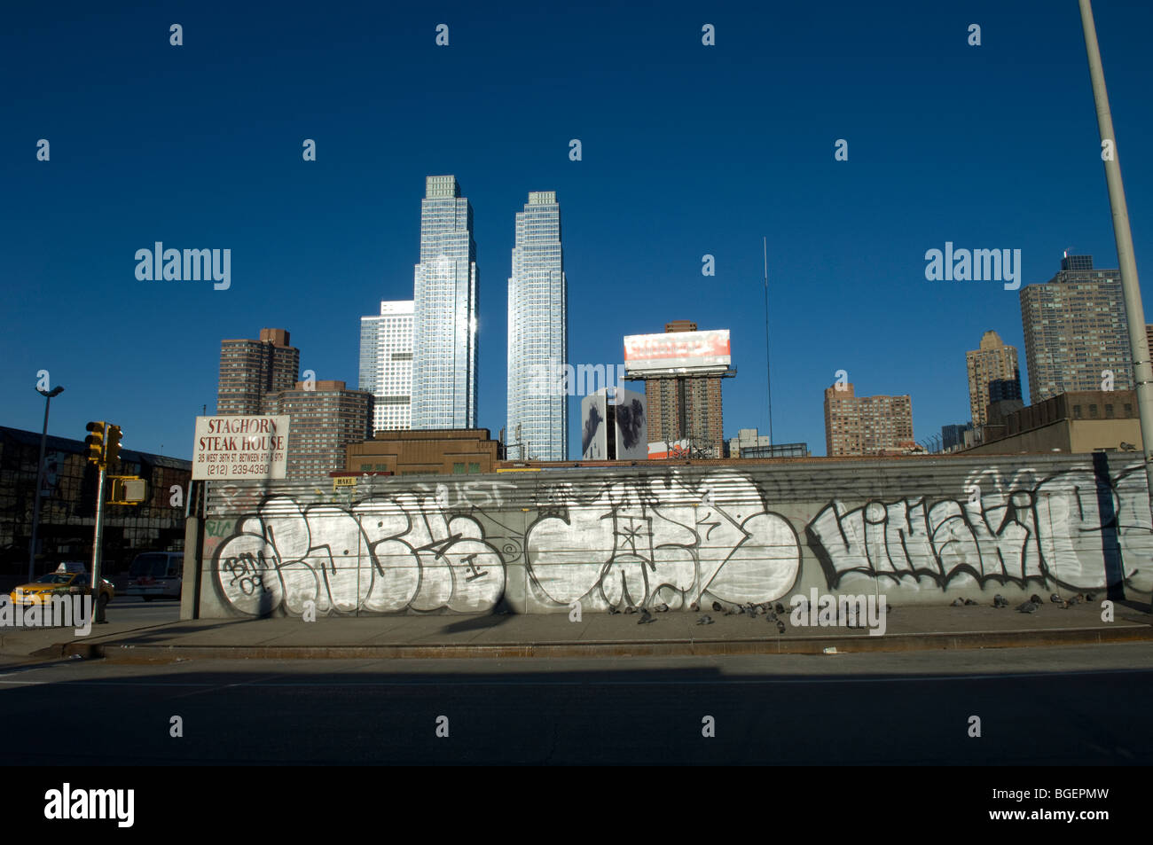 A wall covered in graffiti in the midtown neighborhood of New York on ...