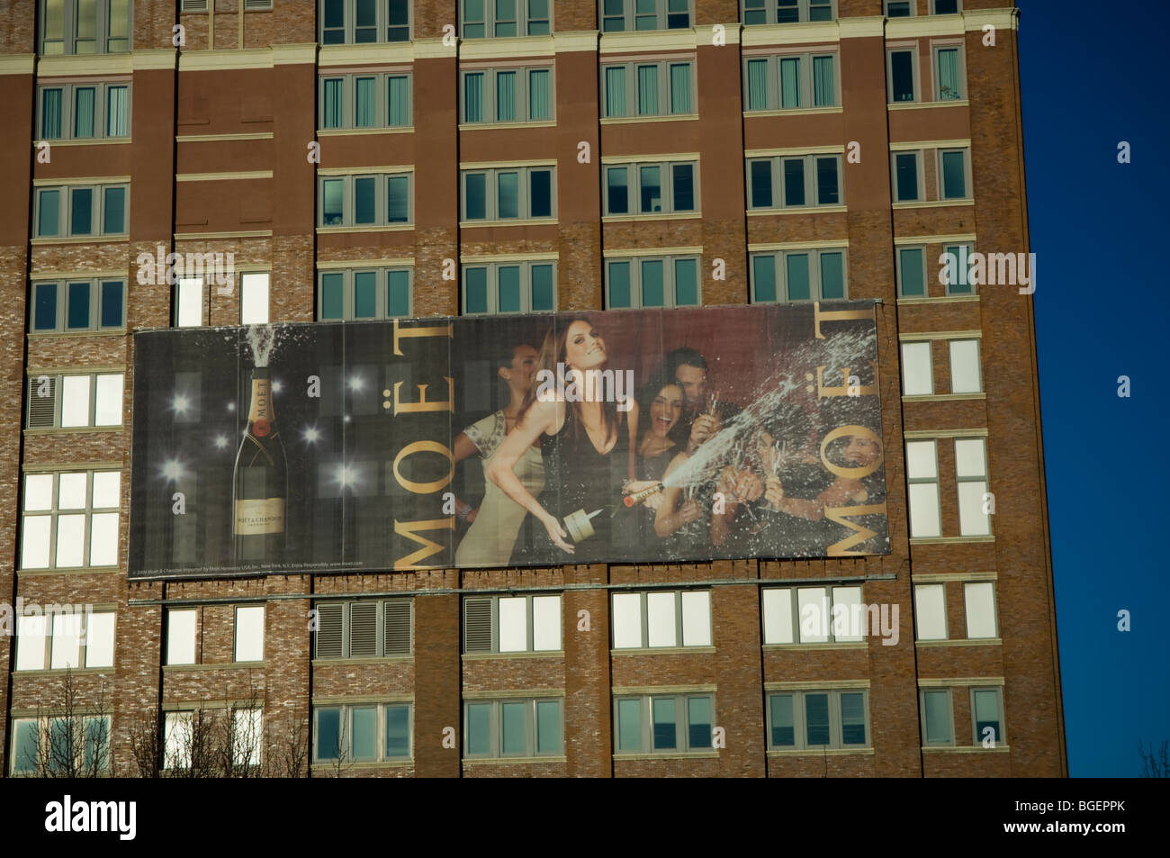 A billboard promoting Moet Champagne in the New York neighborhood of ...