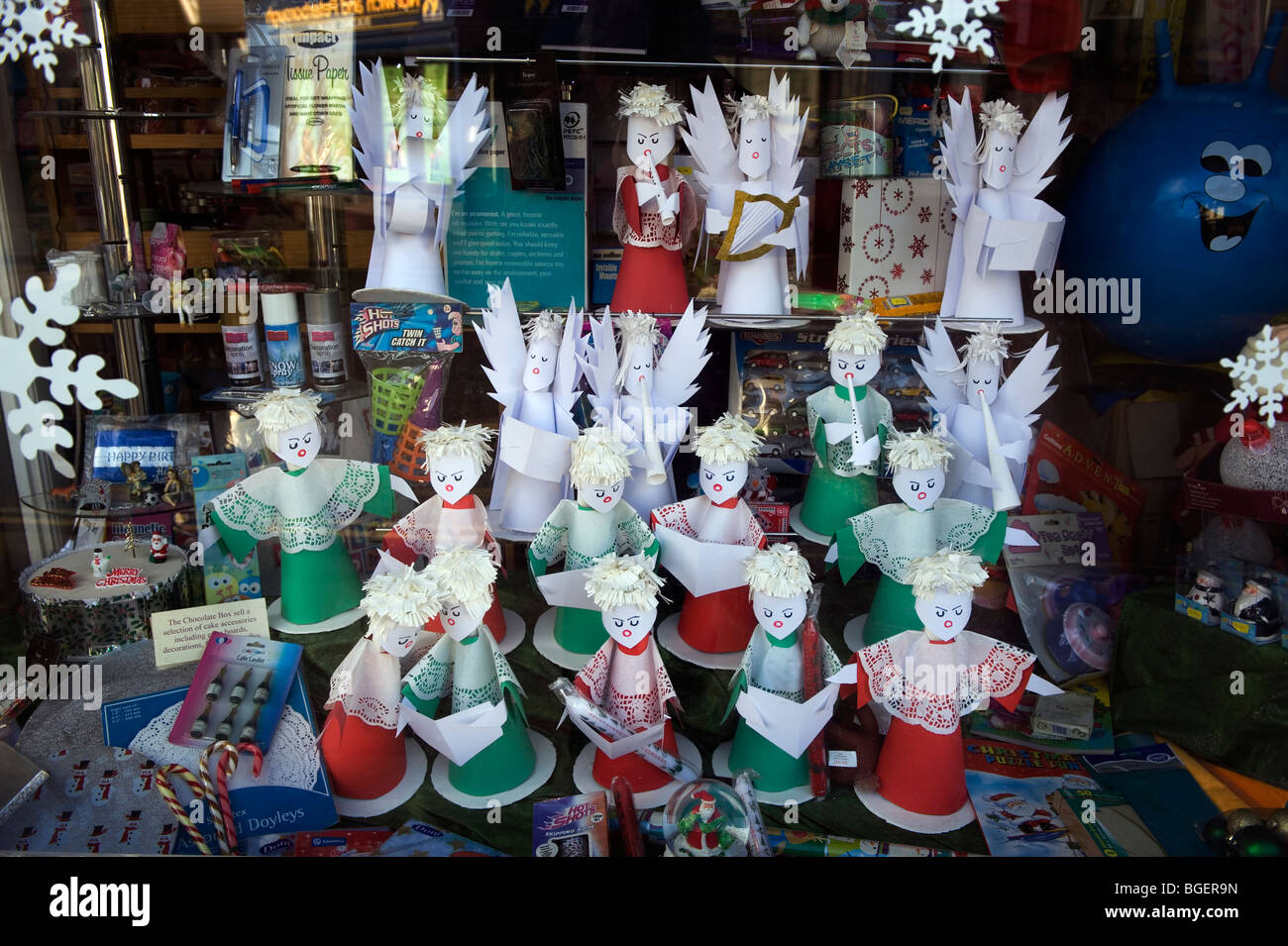 Christmas Angels in a shop window, Bungay, Suffolk, Britain Stock Photo ...