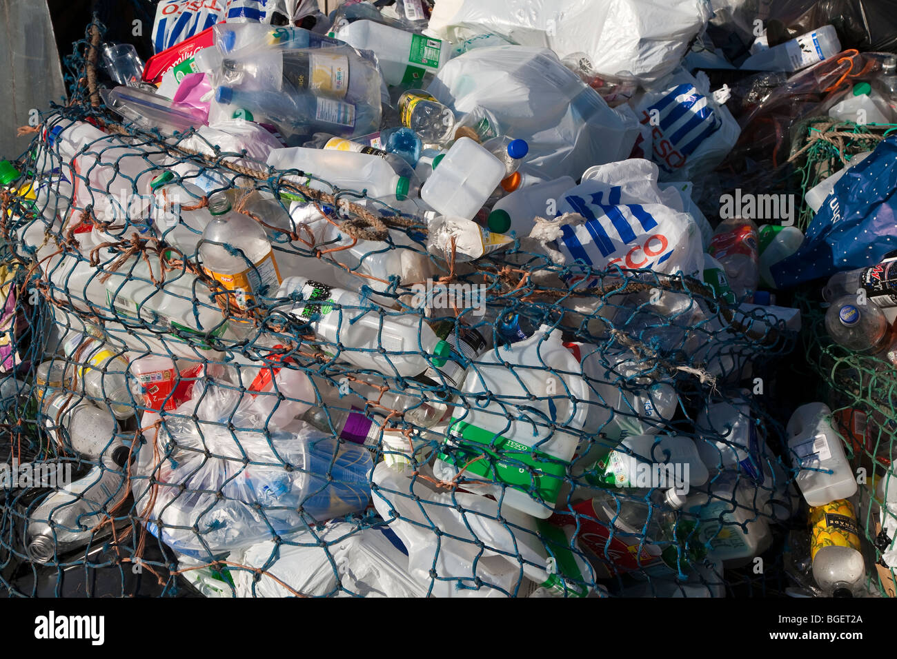 Waste at recycling station in car par UK Stock Photo - Alamy