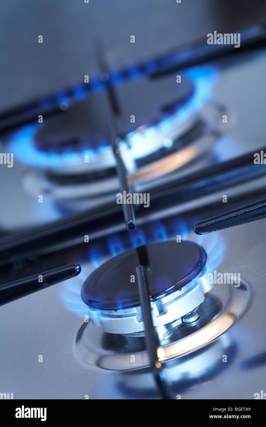 Natural Gas ring burner alight on Kitchen Hob Stock Photo - Alamy