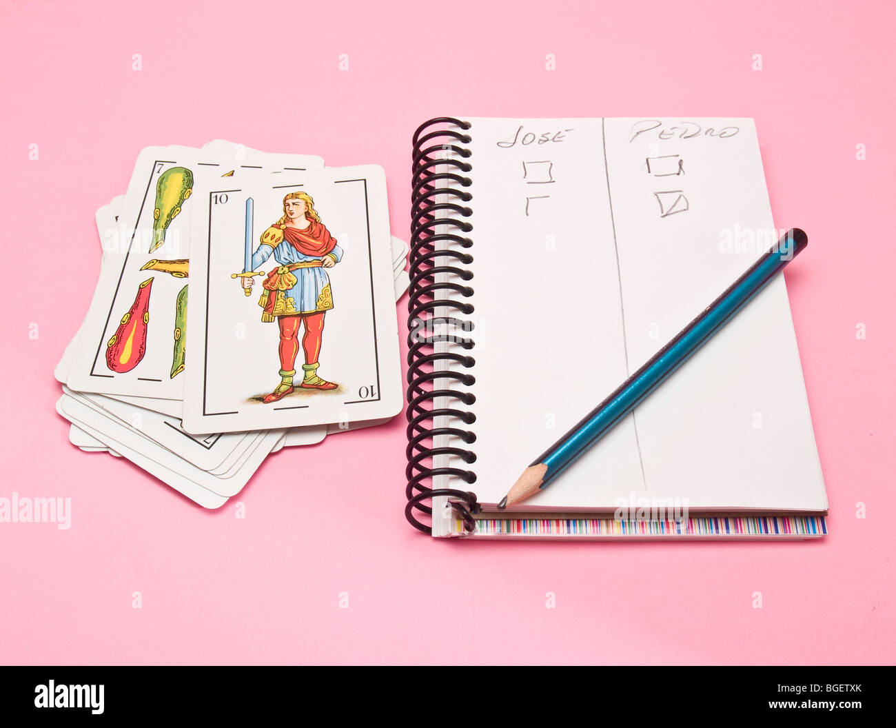 card game notebook and pencil Stock Photo - Alamy