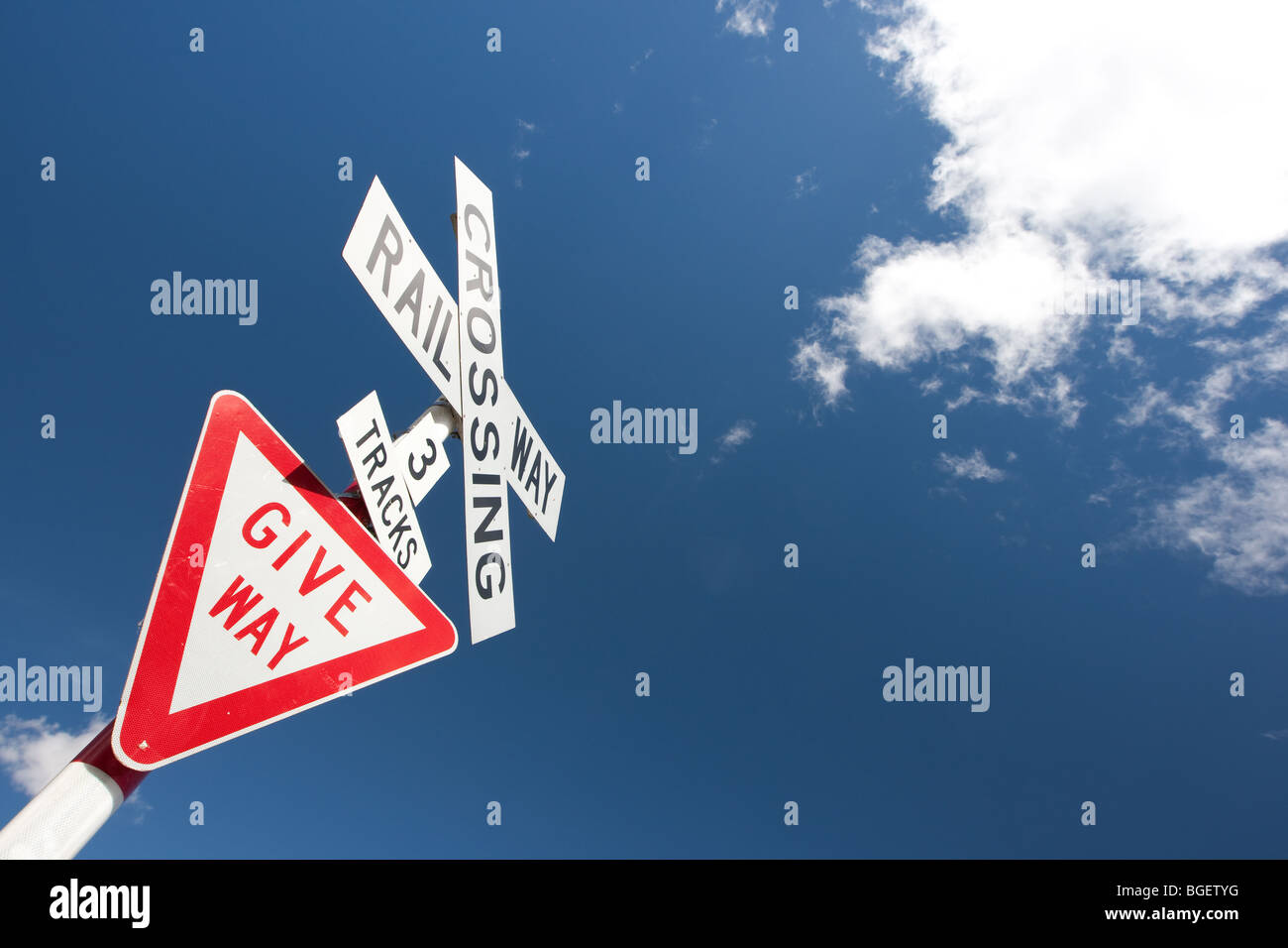 Give Way Railroad crossing sign Stock Photo - Alamy