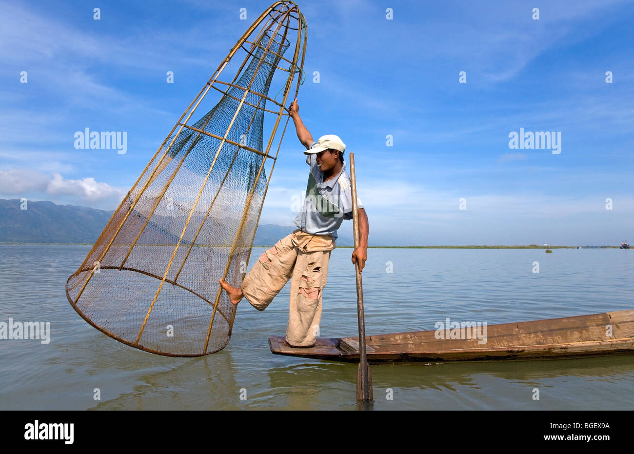 Intha fisherman with traditional cone shaped net. Inle Lake. Myanmar ...