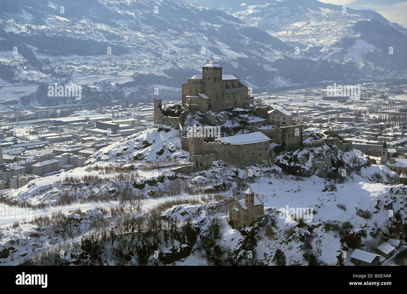The 12th century hilltop Valère Castle and church with stone walls on ...