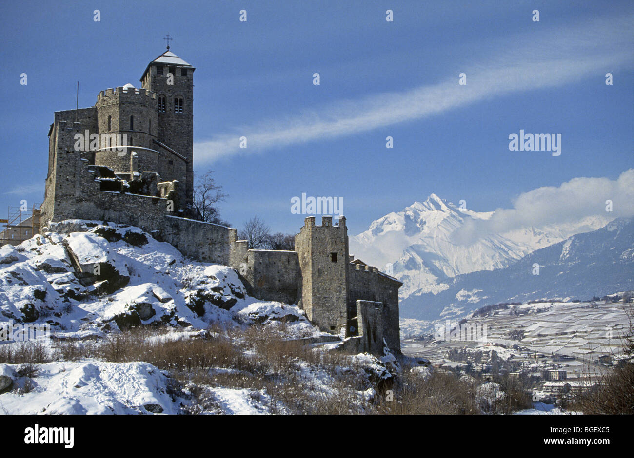 The 12th century hilltop Valère Castle and church with stone walls on ...