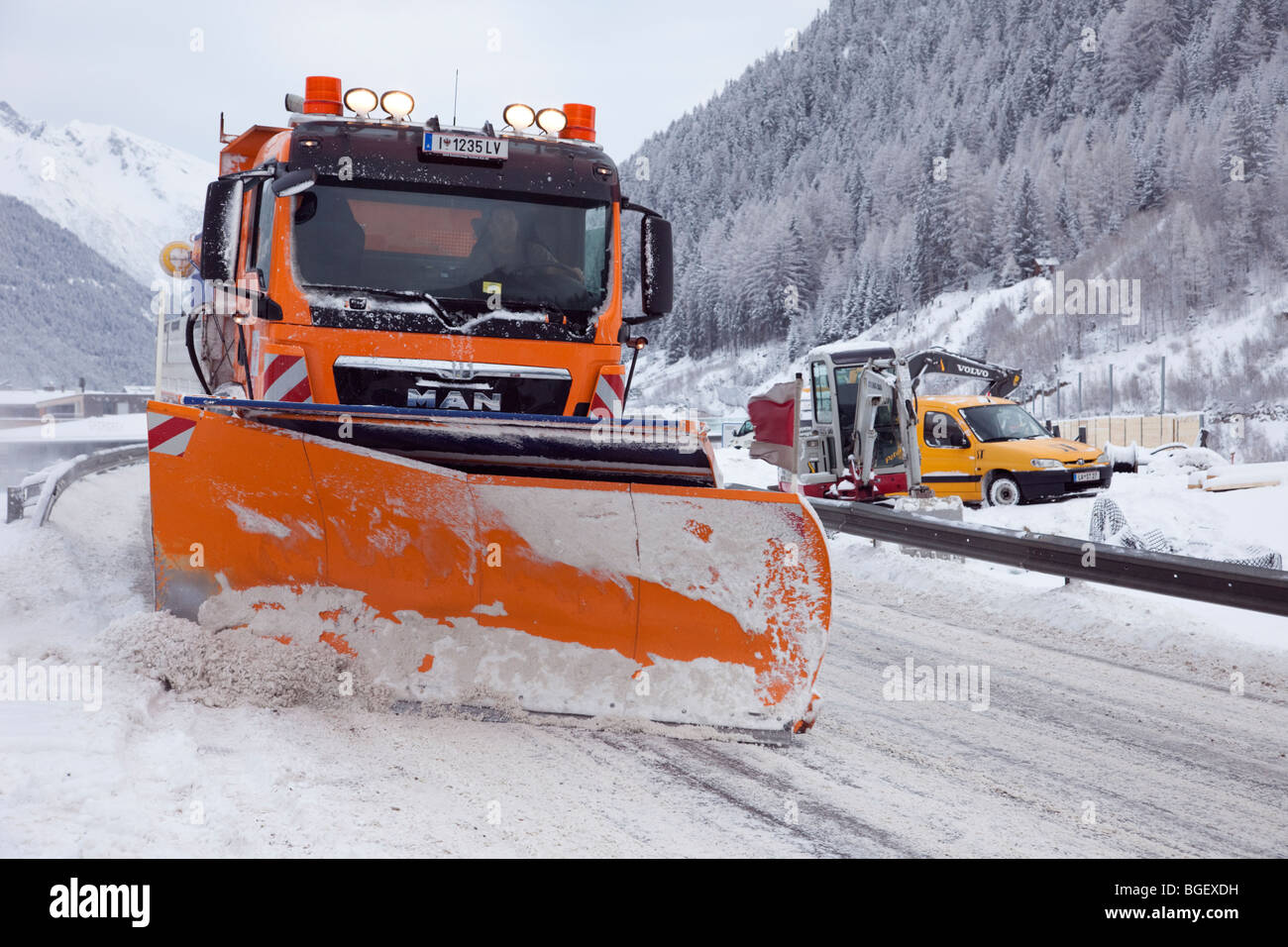 Snowplough clearing highway hi-res stock photography and images - Alamy